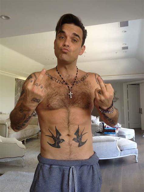 Robbie Williams Tattoos Hand