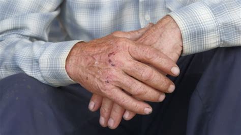 Close Up Of Elderly Couple Join Hands Close Up Slow Motion Footage Of