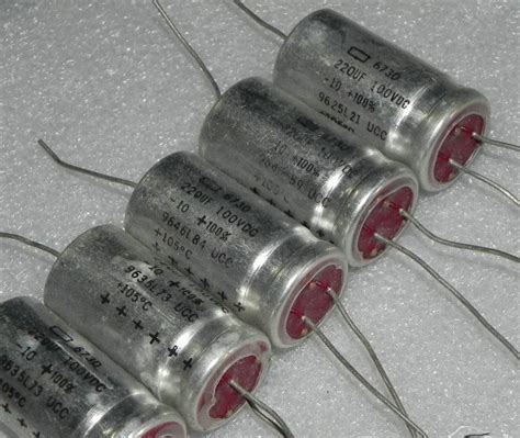 Original Imported Capacitor Electronic Red Head 673d Series 100v220uf Pure Copper Foot Cathode