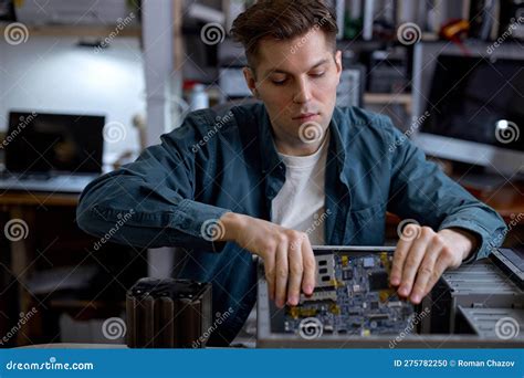 Man Disassembles Broken Computer Computer Service And Repair Concept