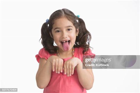 Girls With Long Tongue Photos And Premium High Res Pictures Getty Images