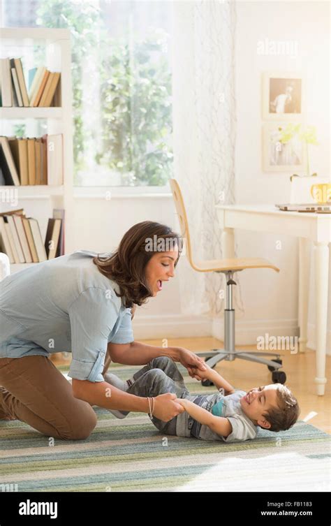 Mother Playing With Son Stock Photo Alamy