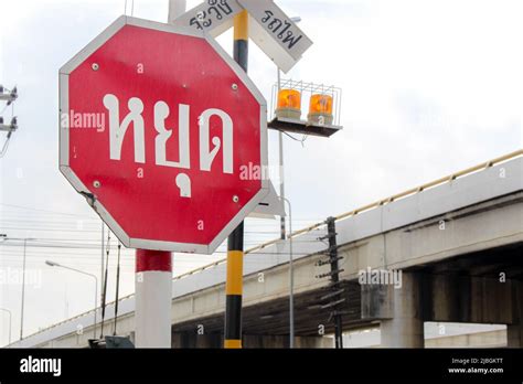 Warn Sign In Thai At Gated Railroad Crossing Thailand Translation Stop Beware Train Stock