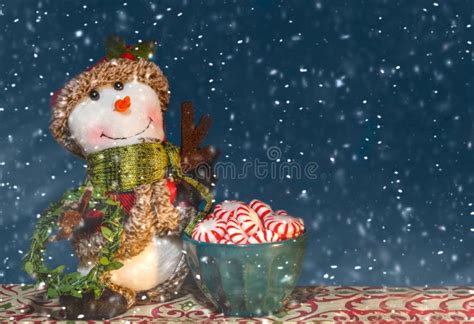 Snowman With Peppermint Candy On Dark Blue Background Stock Image Image Of Colorful Snack