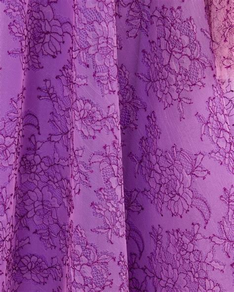Premium Photo Purple Floral Pattern On A Dress