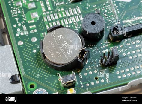 Detailed Close Up View Of A Cmos Battery Installed On A Computer