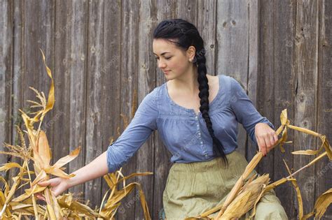 Premium Photo Vintage Portrait Of A Sexy Girl With Corn Concept Of Rural Harvesting