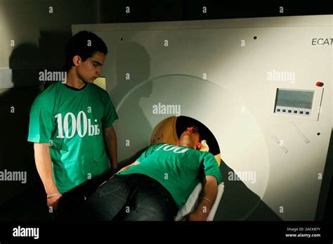 Twin Research Teenage Twins Undergoing An Mri Scan Of Their Brains This Is Part Of Research