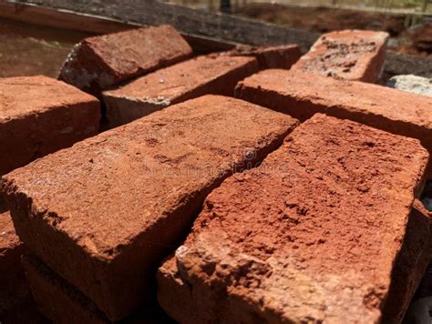 A Pile Of Building Materials A Stack Of Red Bricks For Construction Is Put Together Stock