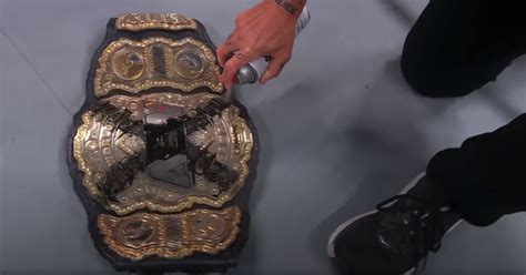 Cm Punk Declares Himself Champ Spraypaints Twitter Logo On Belt