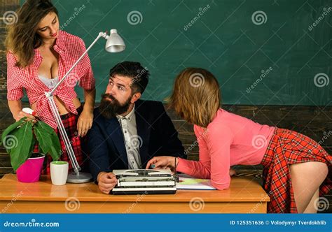 Bearded Sexology Teacher Looks At Two Female Babes Erotic Education And Sex Symbols On