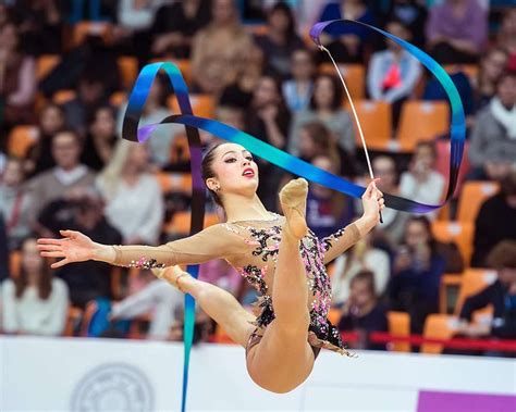 Whats The Difference Between Rhythmic And Artistic Gymnastics Britannica