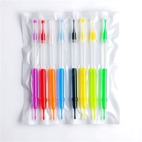 A Color Coded Set Of IV Cannulas In Their Original Sterile Packaging On A White Background Stock