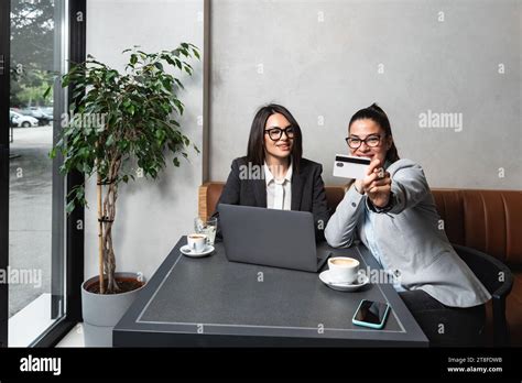 Two Young Business Woman Small Company Owners New Business Idea Sitting