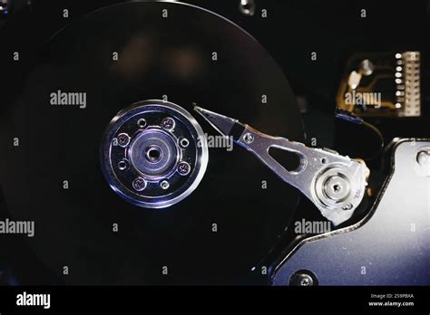 Hard Drive With Its Read Write Head Poised Over The Platter