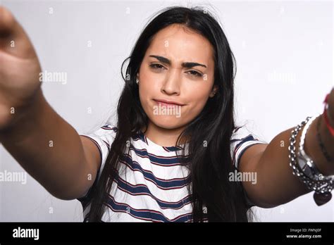 Close Up Of Young Beautiful Woman Taking Selfie Isolated White