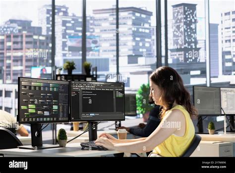 Employee Conducting Code Review To Fix Bugs Identifying Performance