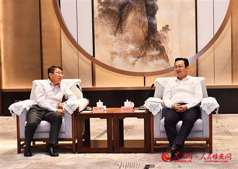 张国华与曙光信息产业股份有限公司总裁历军一行举行工作座谈新区建设发展
