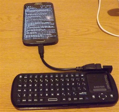 running debian linux gcc emacs git node js npm and harpjs on samsung galaxy s4 oh my