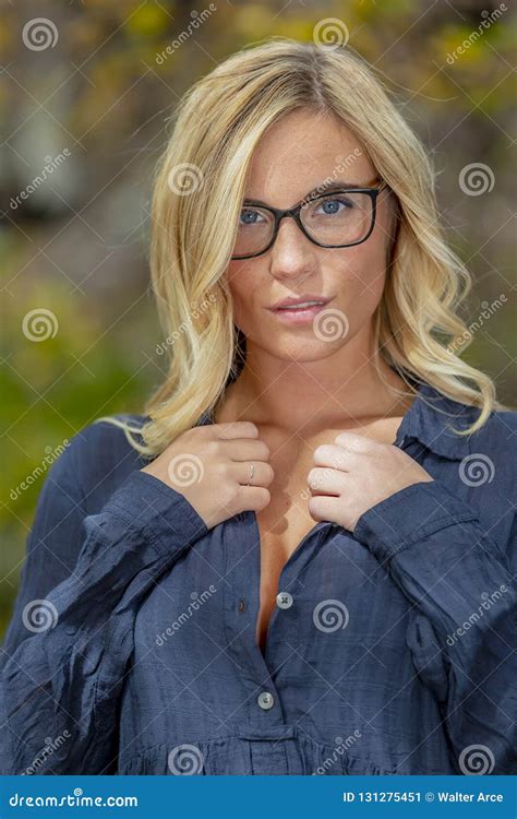 Lovely Blonde Model Enjoying The Outdoors During Fall Break Stock Image