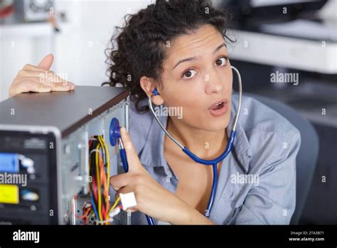 Female Engineer Fixing Broken Computer Hard Drive Stock Photo Alamy