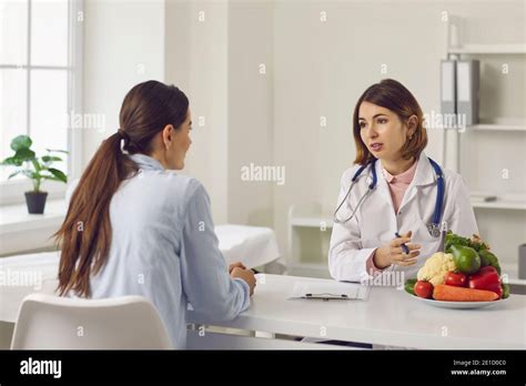 Female Nutritionist Makes A Healthy Diet Plan For A Patient Who Has