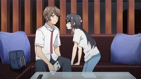 Пара в аниме сидящая на диване