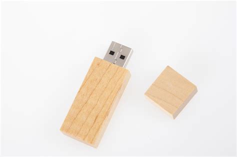Premium Photo Wooden Usb Flash Key Cap Disk Memory Stick In White Background