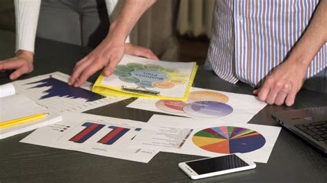 Cropped Close Up Of A Table At The Corporate Office Full Of Business