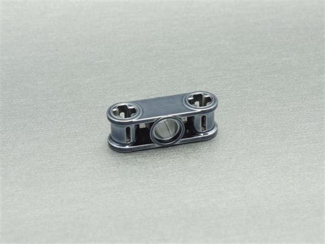 Technic Axle And Pin Connector Perpendicular 3L With Center Pin Hole