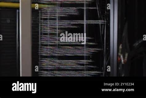 Computer Code Animation Over Server Racks In Data Center Technology