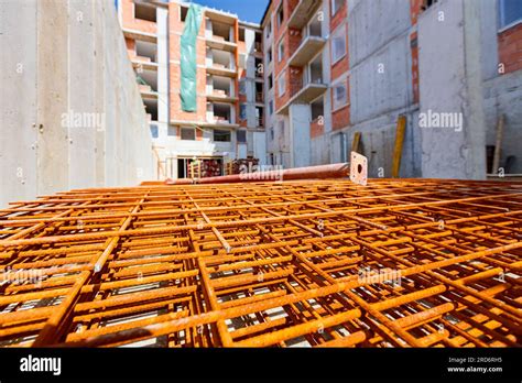 Rusty Quadratic Reinforcement Mesh For Concrete Was Placed For Strength The Edifice At