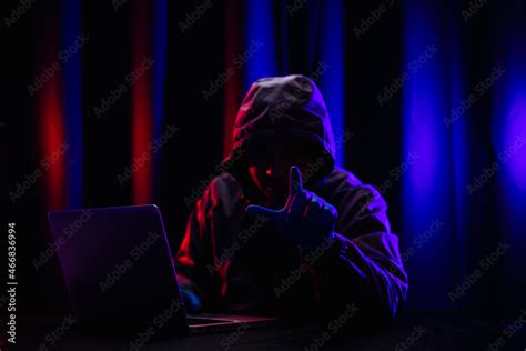 Hackers Wear Hoods To Cover Their Faces Hacking To Steal Important Information Use A Computer