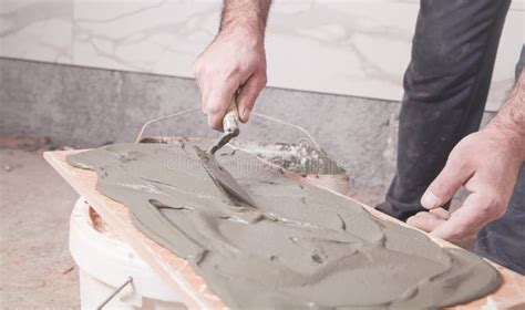 Worker Putting Tiles Adhesive To The Wall Stock Image Image Of Wall Indoor
