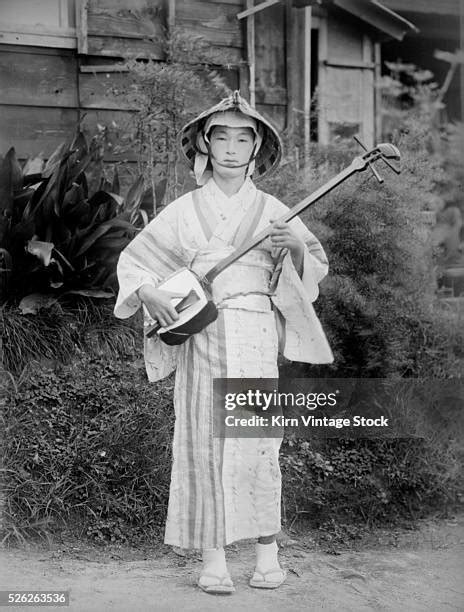 Three Stringed Instrument Photos And Premium High Res Pictures Getty Images