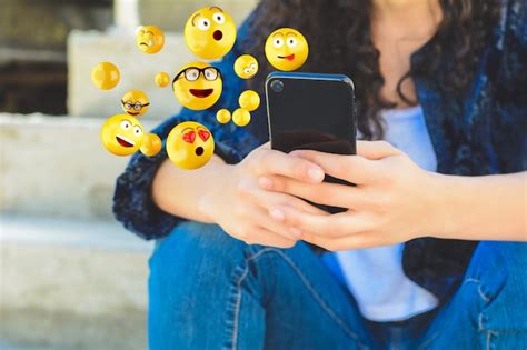 premium photo woman using smartphone sending emojis