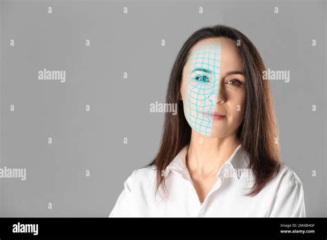 Facial Recognition System Mature Woman With Digital Biometric Grid On Grey Background Stock