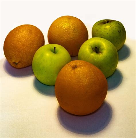 Premium Photo Oranges And Apples