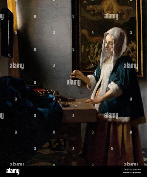 Vermeer Woman Holding A Balance