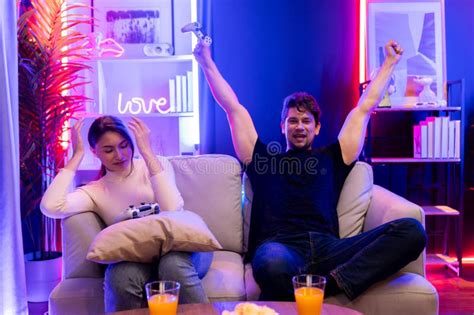 Man Winner Fighting Gamer On Video Game Beside Woman Loser Challenge