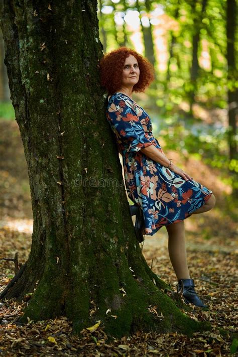 Curly Redhead Lady In The Park Stock Photo Image Of Curls Fashion