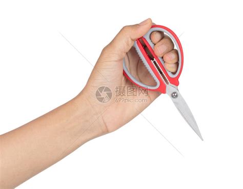 握着红色剪刀的手在白色高清图片下载 正版图片504217610 摄图网
