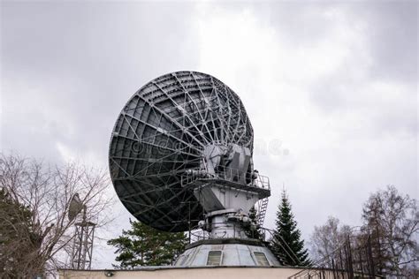 Large Radio Telescope In A Rural Setting Captures Signals From Outer Space While Surrounded By