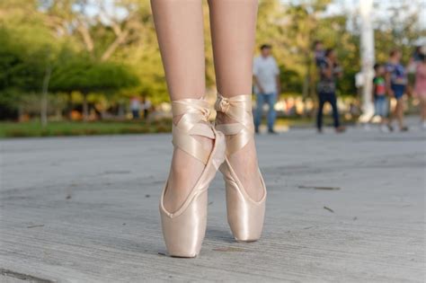 Premium Photo Feet Of A Ballerina Standing On Tiptoe