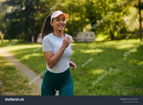 Happy Athletic Woman Running While Exercising Stock Photo Shutterstock