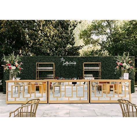 Boxwood Hedge Wall White Door Events