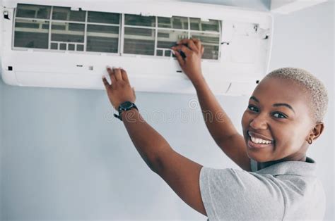 Portrait Black Woman And Electrician For Ac Repair Electrical Box And