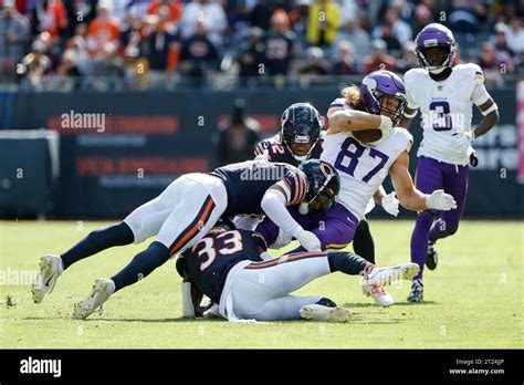Minnesota Vikings Tight End Tj Hockenson 87 Is Tackled By Chicago