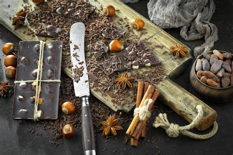 Premium Photo Dark Chocolate In A Composition With Cocoa Beans And Premium Photo Dark Chocolate In A Composition With Cocoa Beans And
