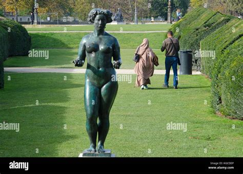 Paris France Jardin Des Tuileries Statue Of A Naked Woman And A Muslim Woman With Her Head
